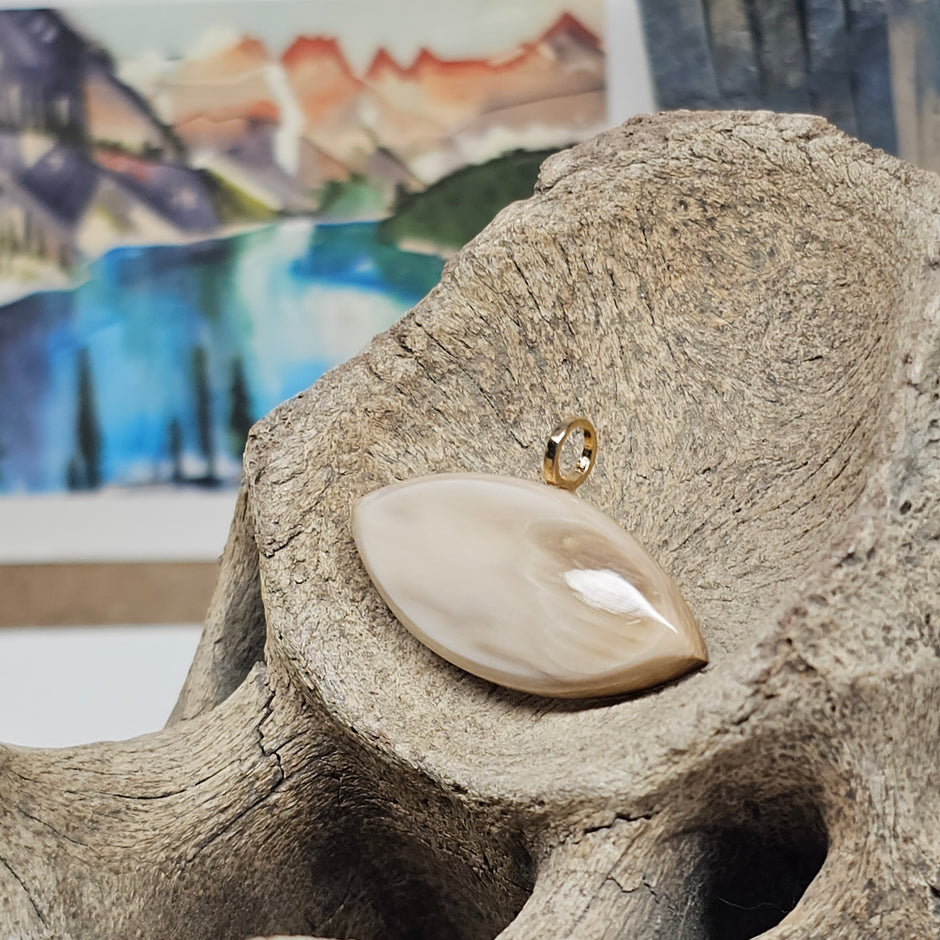 Woolly Mammoth Ivory Jewelry - Handcrafted Fossil Pendants & Knives ...